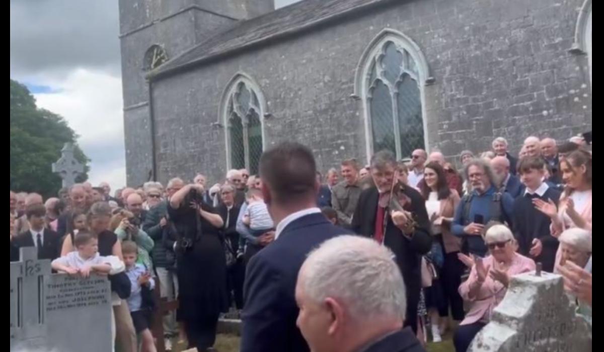 WATCH: Poignant moment at Harry Gleeson's burial as his fiddle is used ...