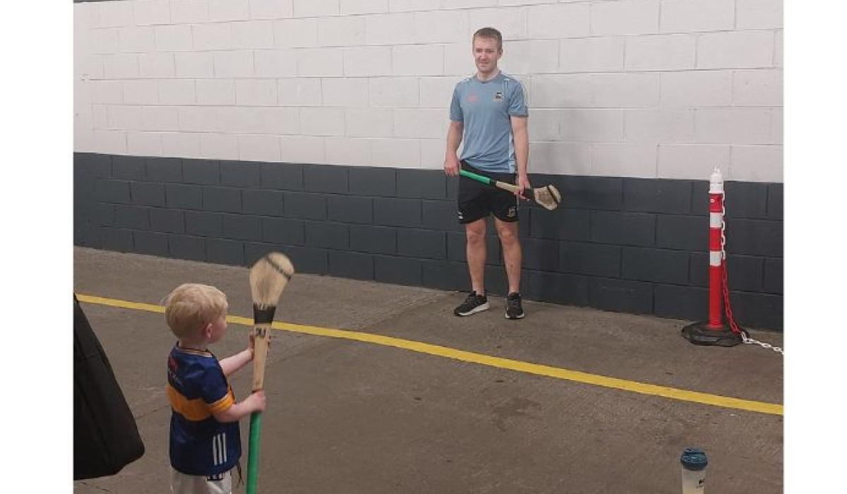 UP TIPP! Noel McGrath plays hurling with his son Sam in the tunnel ...