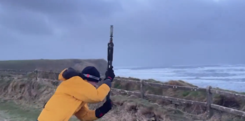 WATCH: UK weather enthusiasts 'fight' the elements at Irish beauty spot ...